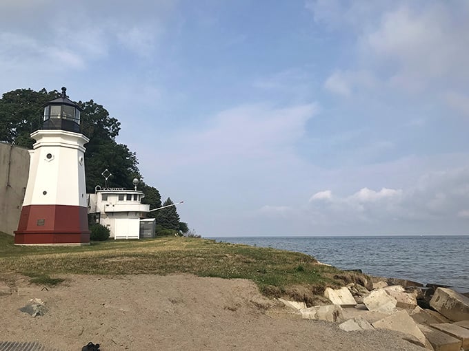 The Vermilion Lighthouse stands guard over Lake Erie, small but mighty, like a determined terrier.