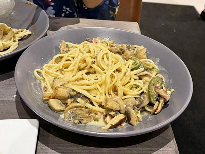 Mushroom pasta that looks like someone in the kitchen actually respects fungi and carbohydrates equally.