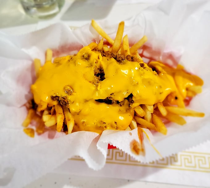 Golden fries buried under a molten avalanche of cheese and chili&mdash;this is what happiness looks like on a plate.