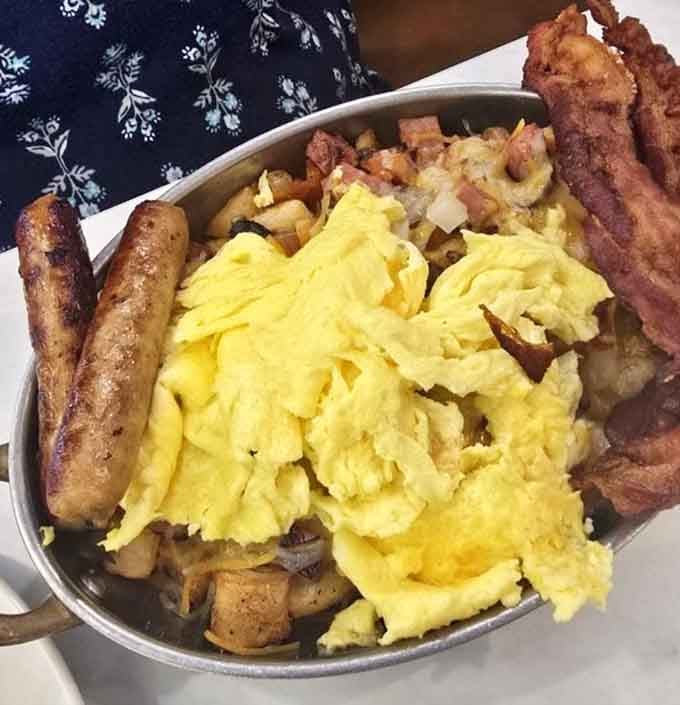 The Meat Lovers Skillet: eggs, bacon, sausage, potatoes, and enough protein to fuel your entire day, maybe two.