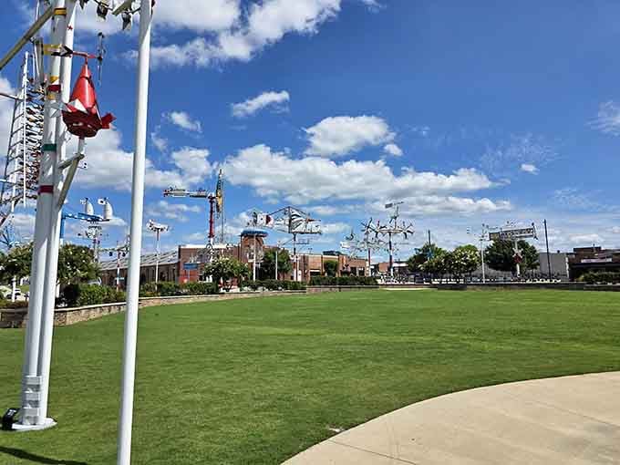 A perfectly manicured lawn meets towering metal madness, because why should parks be predictable and boring anyway?