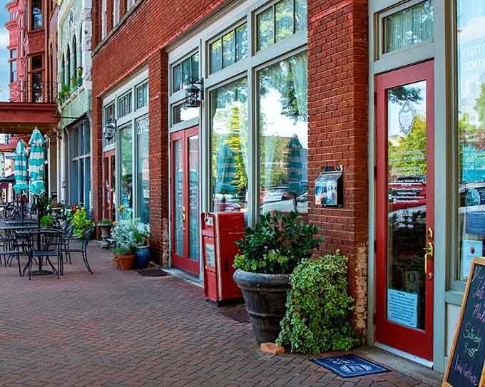 Brick sidewalks and welcoming storefronts create the kind of shopping experience your grandmother would have recognized and loved.