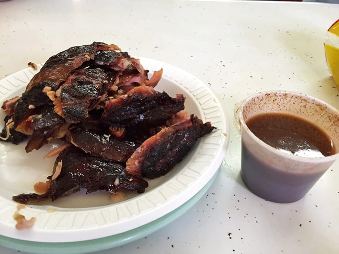 Those glistening, smoky ribs with sauce on the side prove meat this good needs minimal adornment.