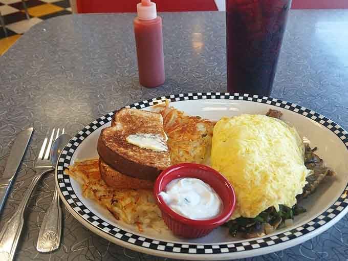 When your omelet arrives looking like a fluffy yellow pillow of deliciousness, you know someone in that kitchen cares.