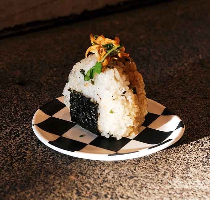 Rice shaped into pure comfort, topped with tandoori chicken that brings the flavor like a Bollywood musical brings the drama.