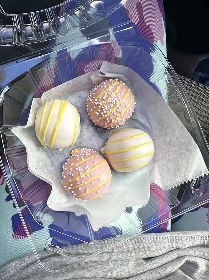 Cake balls dressed in pastel stripes and sprinkles—because sometimes sophistication comes in bite-sized packages with serious style.