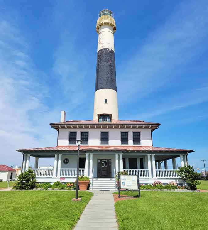 Standing tall against blue skies, this lighthouse has guided ships safely home while collecting its own mysterious tales along the way.