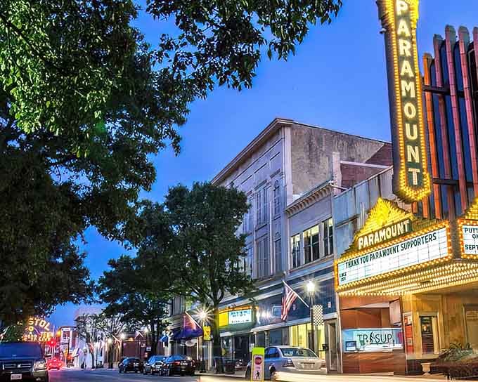 That glowing marquee at dusk proves small-town entertainment doesn't need Netflix to feel magical and special.