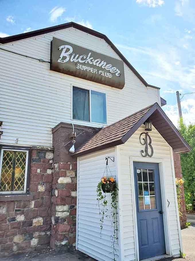 That quirky vintage sign perched atop mismatched architecture is pure character, hinting at the delicious surprises waiting inside.