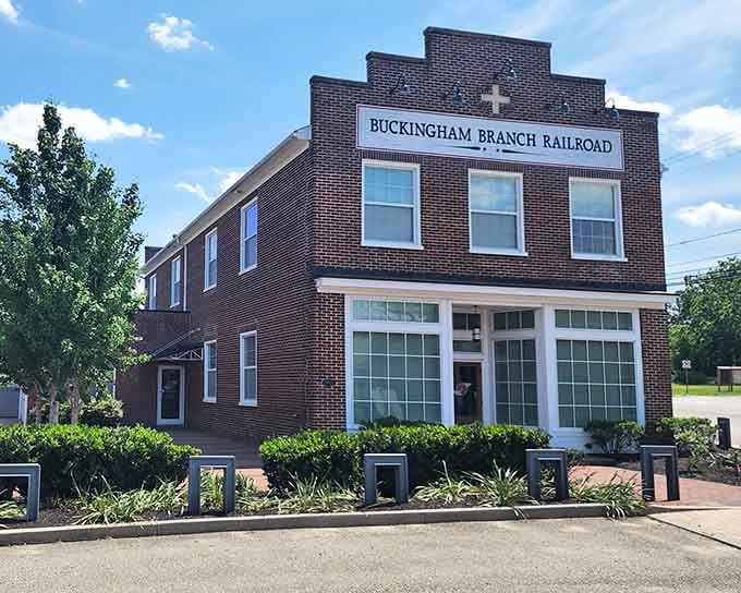 This handsome brick building with pristine white trim looks ready for its close-up, channeling serious Mayberry RFD railroad depot vibes.
