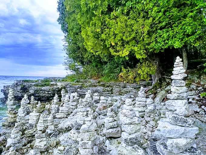 Visitors stack stones along the shore like nature's own art installation, each tower a small meditation.