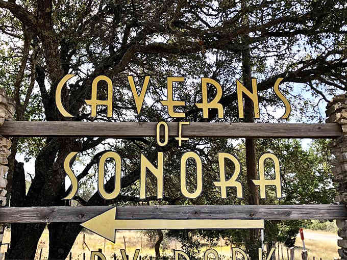 Golden letters point the way to underground chambers where millions of years created breathtaking crystal formations.