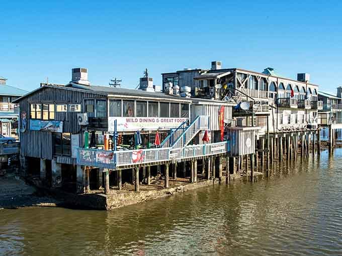 Old Florida charm lives on in these weathered buildings perched above the water like patient fishermen.