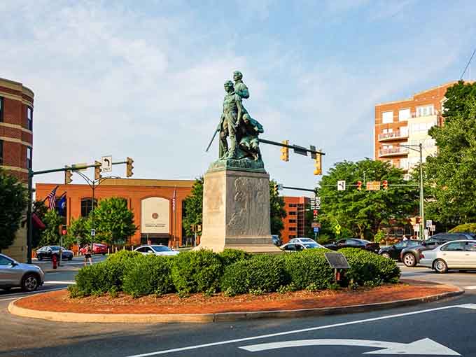 This statue anchors downtown's historic heart where past and present shake hands every single day.