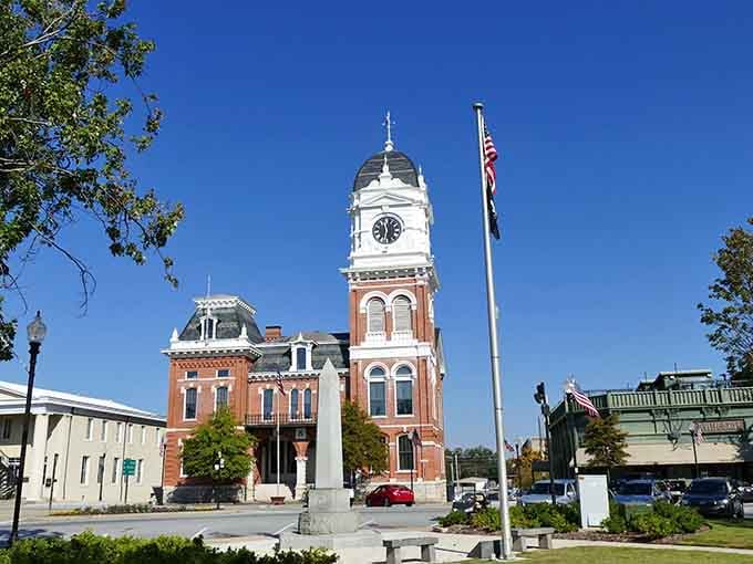 The town square at dusk looks like Andy Griffith might whistle his way around the corner.