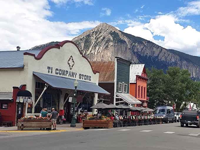 The Company Store sits ready to welcome visitors beneath that magnificent peak that dominates every view in town.
