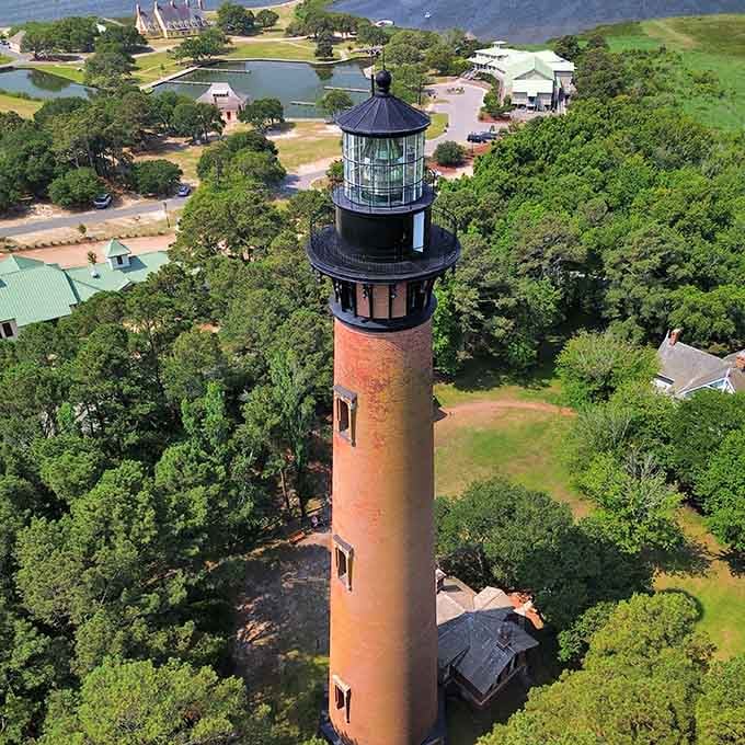 This brick beauty stands like a warm terracotta tower, proving that not all lighthouses need paint to make a statement.