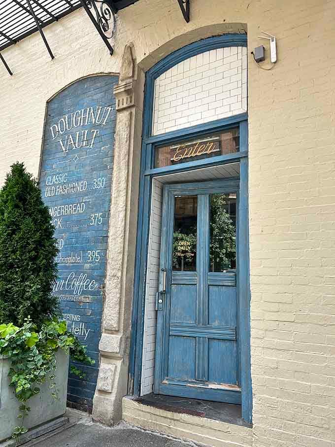 This blue door tucked into historic brick feels like discovering a secret passage to a world of buttermilk old-fashioneds.