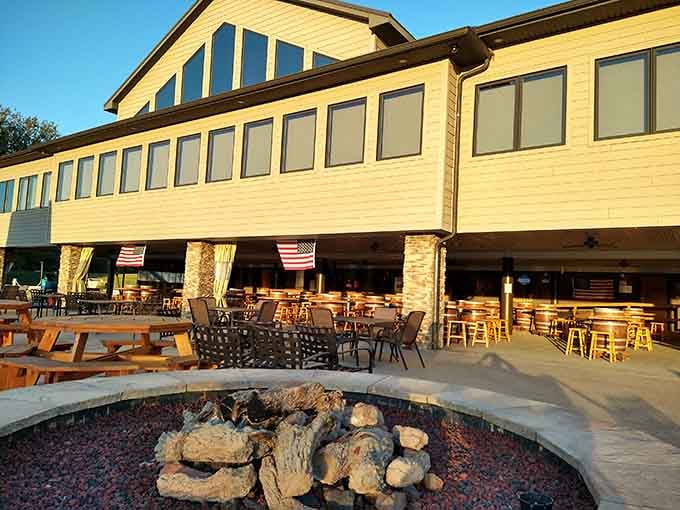 Sunshine-yellow siding and riverside seating prove that happiness comes in architectural form and generous portions.
