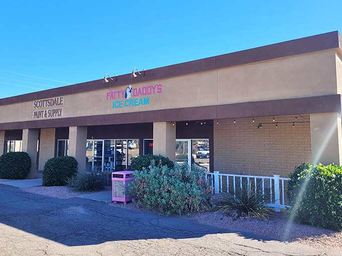 That playful pink signage promises sweet relief from the desert heat, one generous scoop at a time, friend.