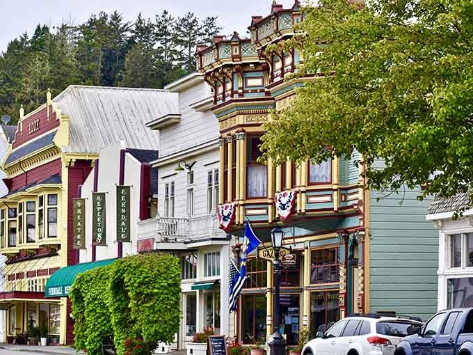 Every building tells a story here, painted in hues that would make a box of crayons jealous and proud.