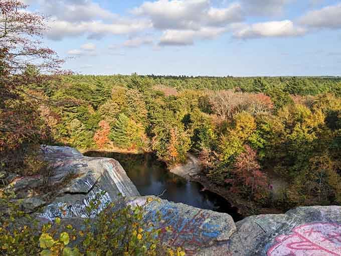 Autumn colors paint the rocky overlook, but the forest's eerie reputation adds an extra layer of intrigue.