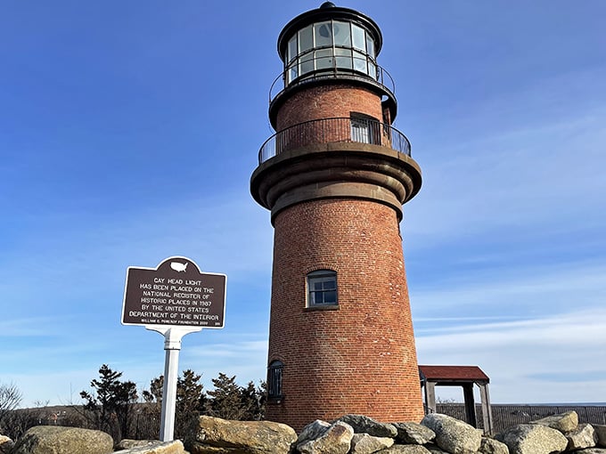The tall lighthouse stands proudly on the cliffs, a testament to centuries of guiding ships.