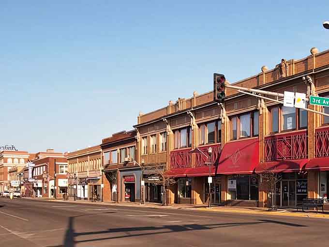 Those distinctive awnings and vintage details showcase a town where character costs less than cookie-cutter suburban developments.