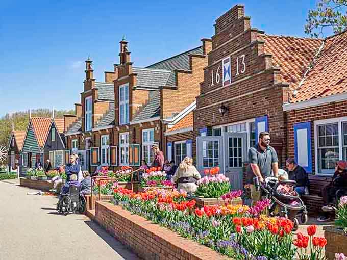 Dutch architecture blooms alongside tulips in a charming streetscape that transports you straight across the Atlantic Ocean.