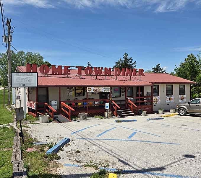 Bold red letters spelling "HOME TOWN DINER" deliver exactly what they promise&mdash;no false advertising, just good food and friendly faces.