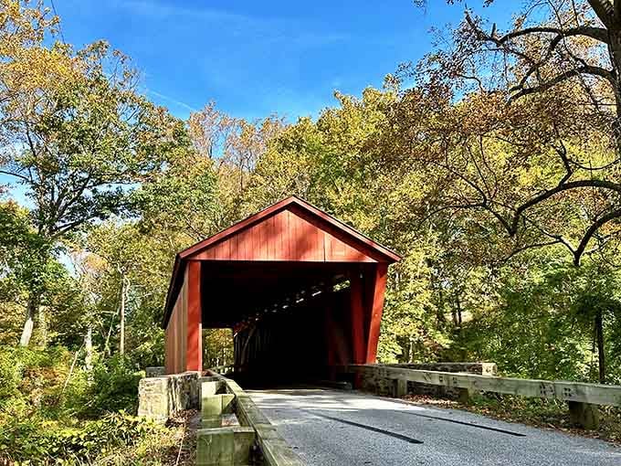 That charming red covered bridge looks like a postcard until you hear the local legends about it.