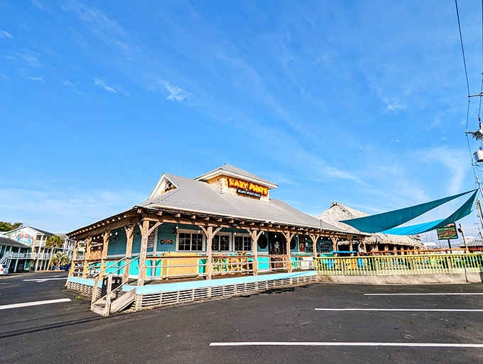 Turquoise and timber create that perfect beach shack vibe where flip-flops are practically required footwear.