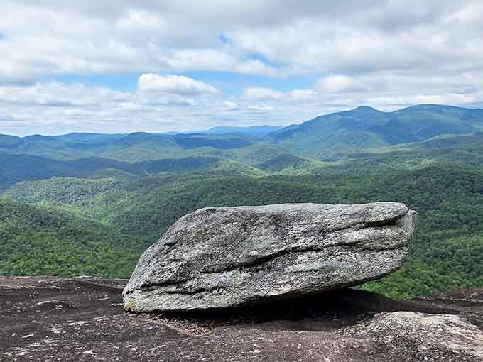 That perfectly balanced boulder has been playing the ultimate game of "don't fall down" for thousands of years and winning.