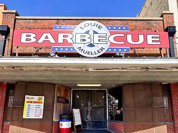 That bold rooftop sign has been guiding barbecue pilgrims like a smoky North Star for over a century.