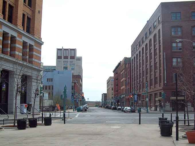 Milwaukee's downtown streets showcase grand historic buildings that have witnessed over a century of city life and transformation.