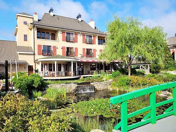 That bright green bridge over the lily pond screams Monet louder than any museum audio guide.