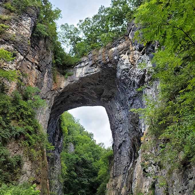 Nature carved this limestone arch over millions of years, creating a bridge that once impressed George Washington himself.