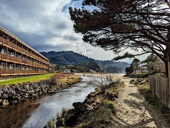 Where creek meets coastline, dramatic skies paint the perfect picture of Oregon's moody coastal beauty.