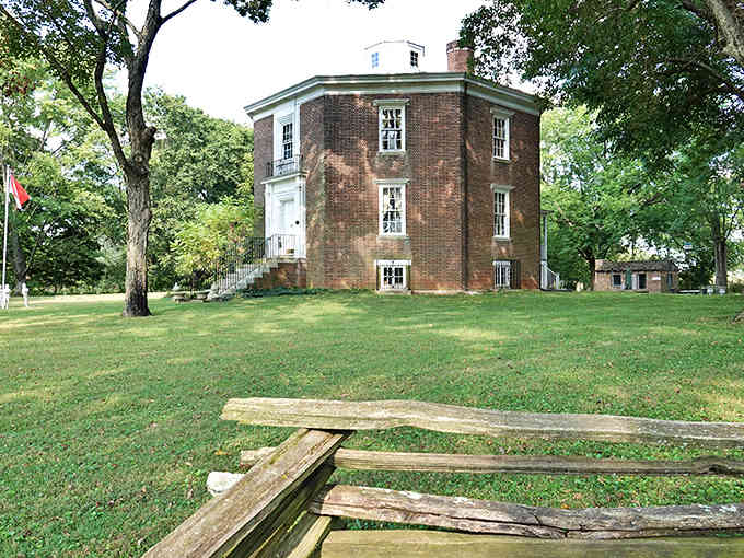 This peculiar octagonal brick house sits like an architectural riddle in the countryside, defying conventional home design with geometric precision.