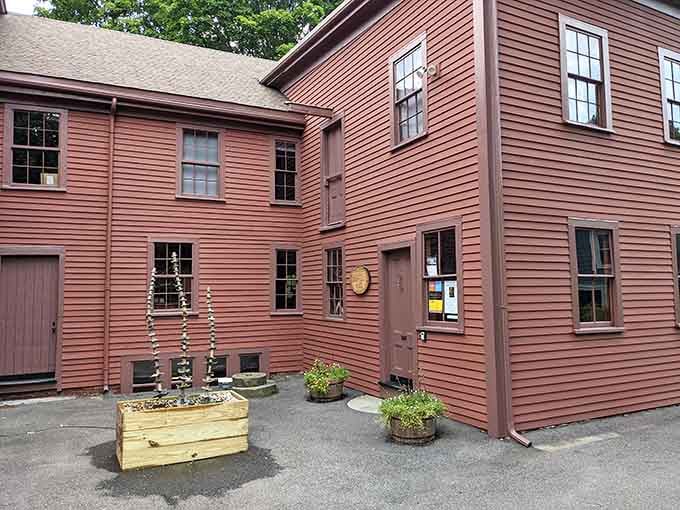 Colonial-era red siding and simple windows hide the remarkable oval frame-making operation that's been running for generations inside.