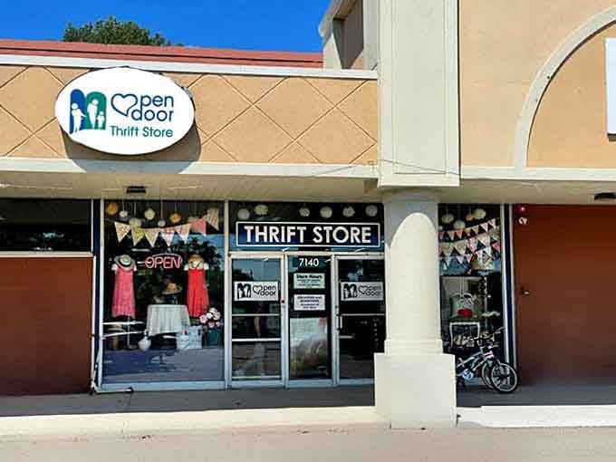 Those colorful window displays peek through the glass, hinting at the carefully curated bargains waiting inside.