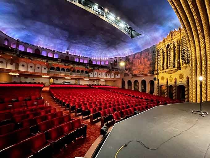 Red velvet seats face a grand stage in this stunning theater that looks like a Spanish palace came to Phoenix.