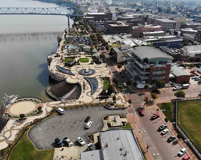 The riverfront curves gracefully like a welcoming embrace, offering peaceful views that calm the soul instantly.