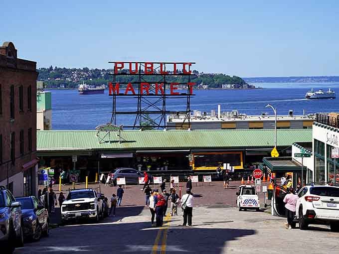 That iconic red sign welcomes you to Seattle's beating heart, where fresh fish literally flies through the air.