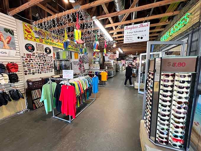Sunglasses and colorful tees hang like memories waiting to be rediscovered by someone who appreciates the good old days.