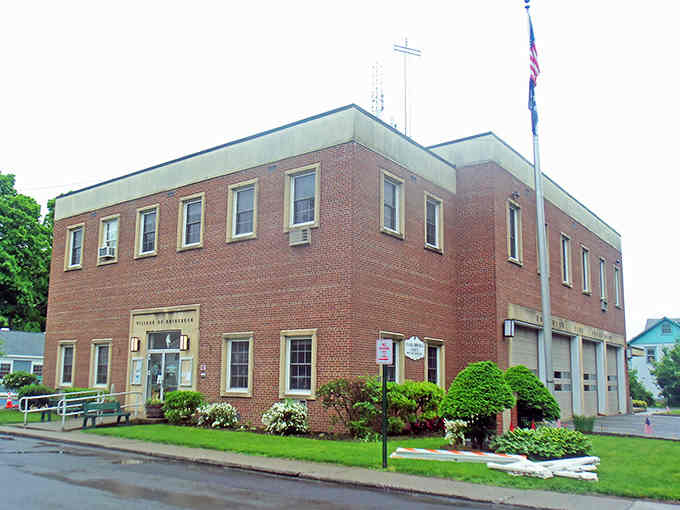 The brick firehouse sits proudly on manicured lawns, looking like it could star in a Mayberry episode without changing a thing.