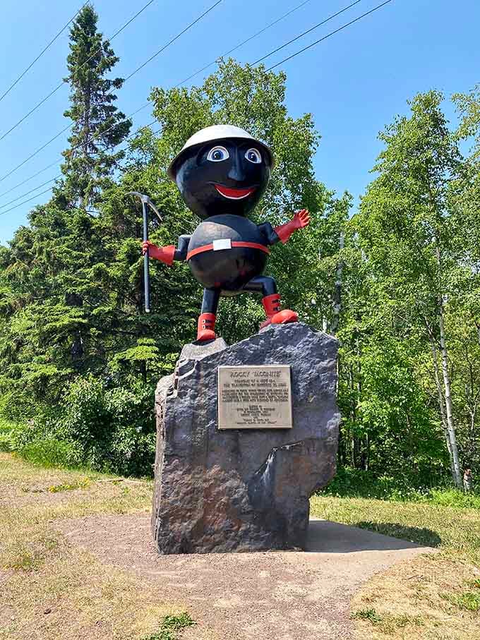 Rocky's enthusiastic wave and bright red boots bring pure joy to celebrating the hardworking mining heritage.