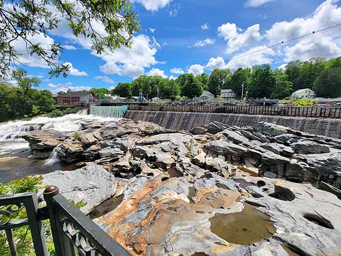 Water-carved potholes in the riverbed create natural sculptures that look like abstract art from a modern gallery opening.
