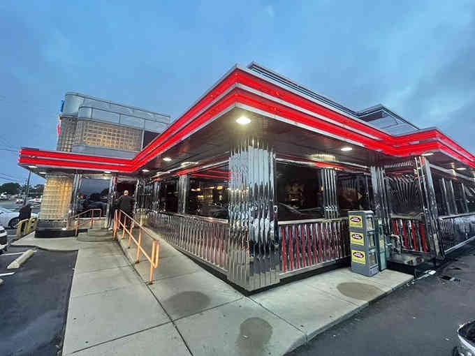 Chrome gleams and neon blazes in this perfectly preserved slice of 1950s Americana where milkshakes reign supreme.