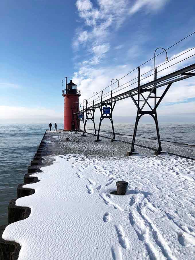 Winter transforms the pierhead into a frozen wonderland, where brave souls venture out for views worth the chill.